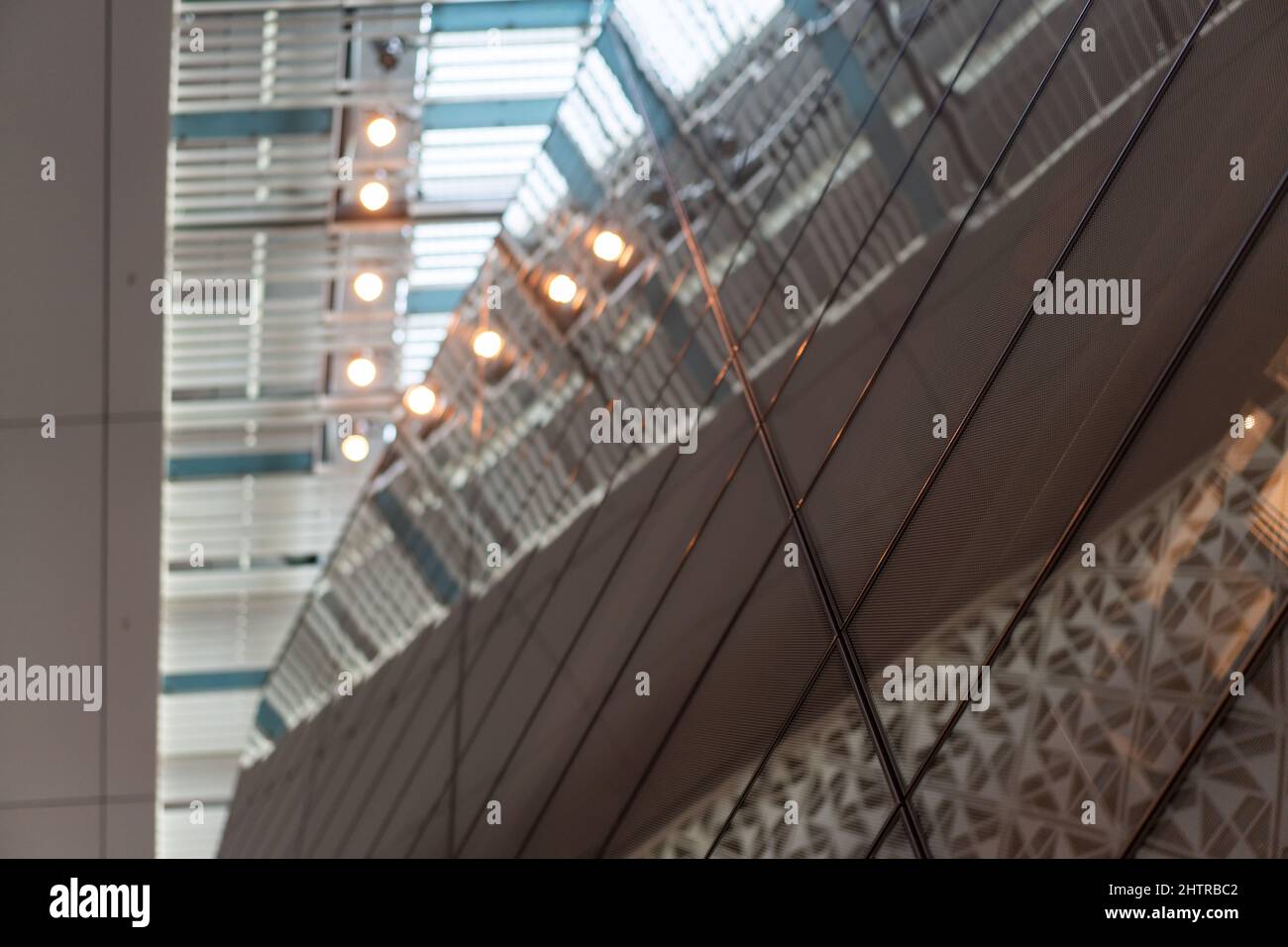 Angled parallel lines on the facade of a modern architecture building ...