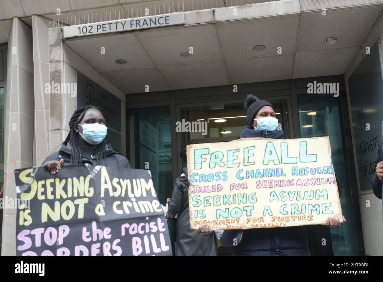 the treatment of refugees came under a [rotests at the justice ...