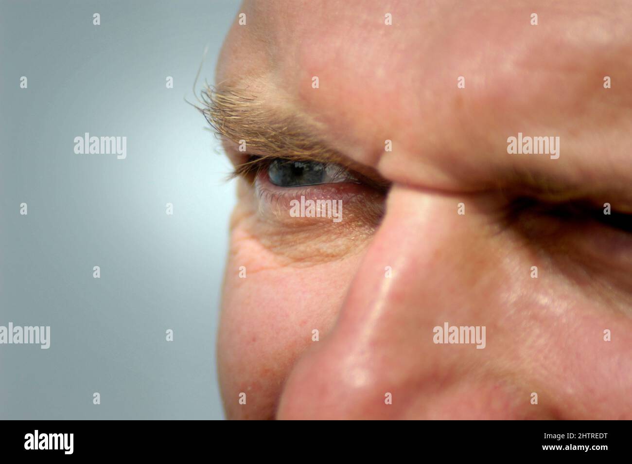 Man's eye looking left Stock Photo - Alamy