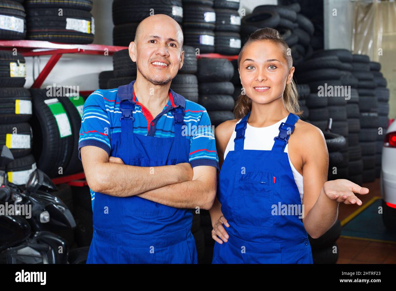 Workers in overalls fix hi-res stock photography and images - Alamy