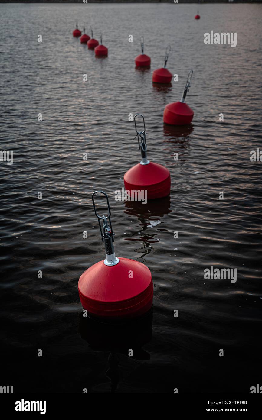 Vertical photo of buoys on the sea Stock Photo - Alamy