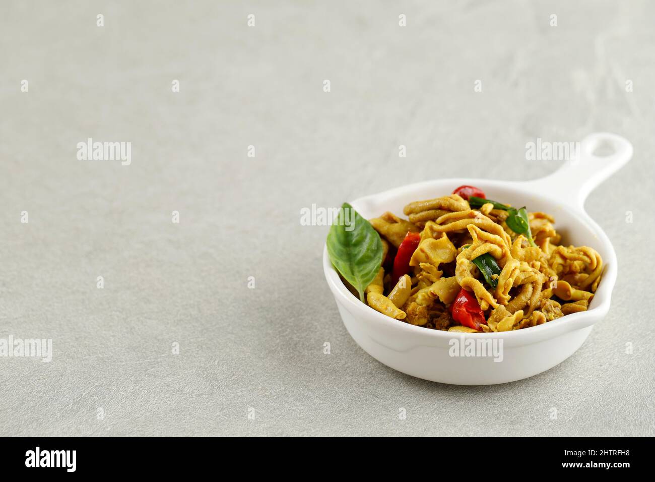 Stir Fry Spicy Chicken Intestine (Tumis Usus) on White Plate, Copy ...