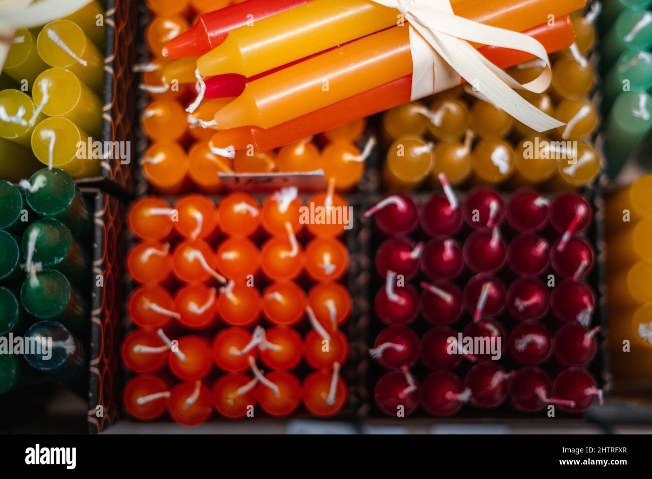 Top view of a collection of colored candles in boxes for sale Stock ...