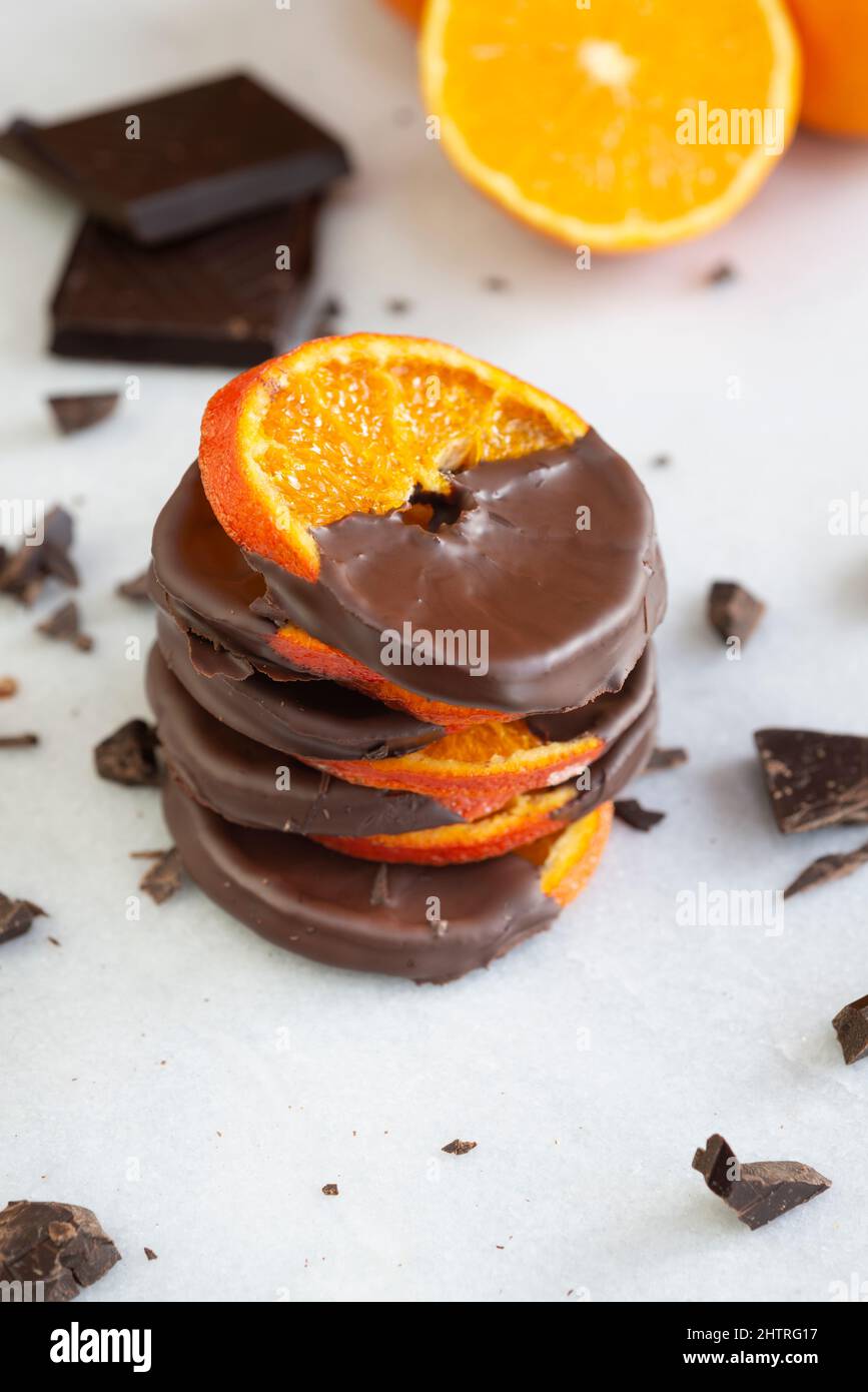 Stacked chocolate dipped candied orange slices Stock Photo - Alamy