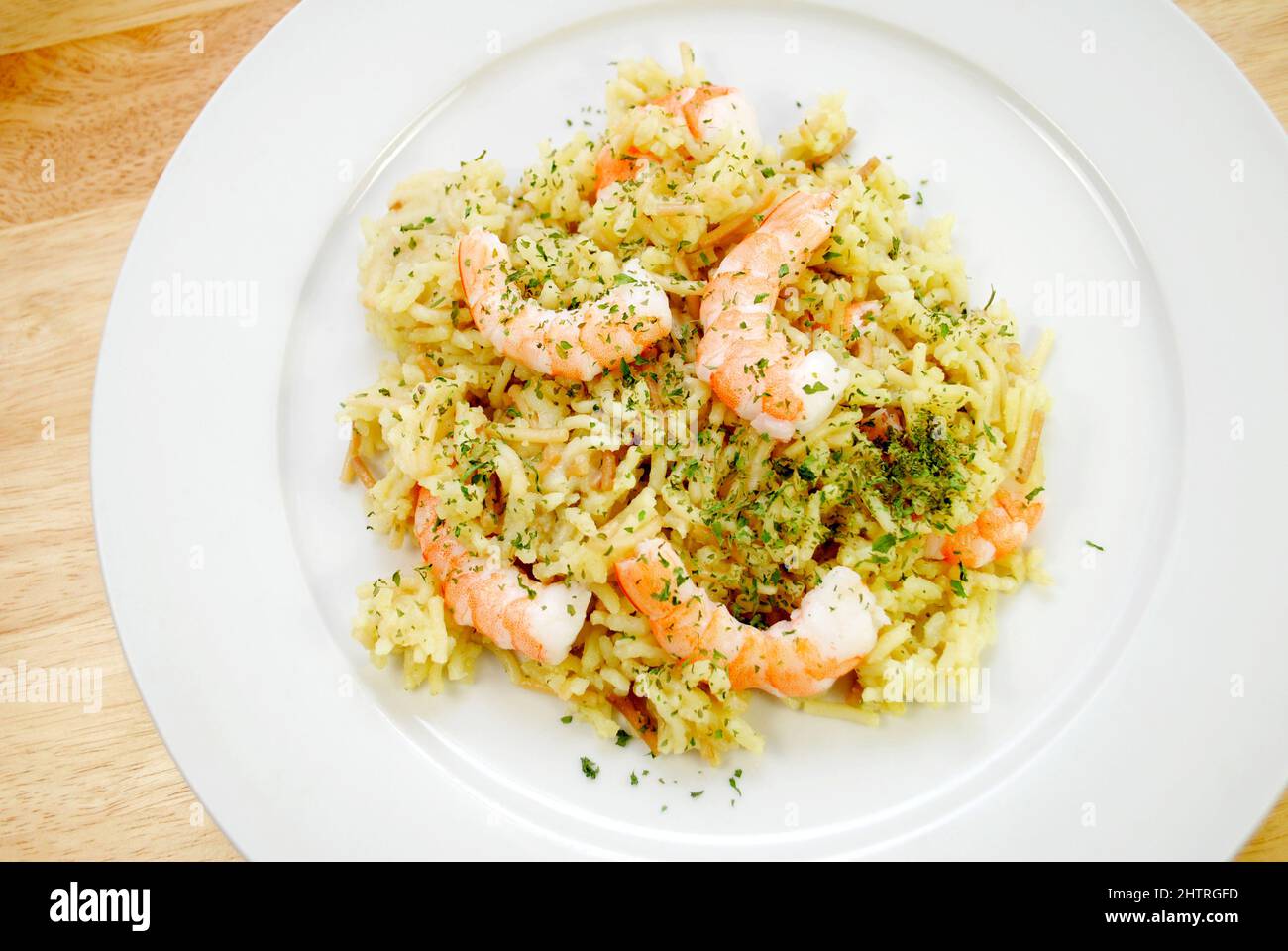Plated Shrimp Scampi with Wild Rice and Vermicelli Stock Photo - Alamy