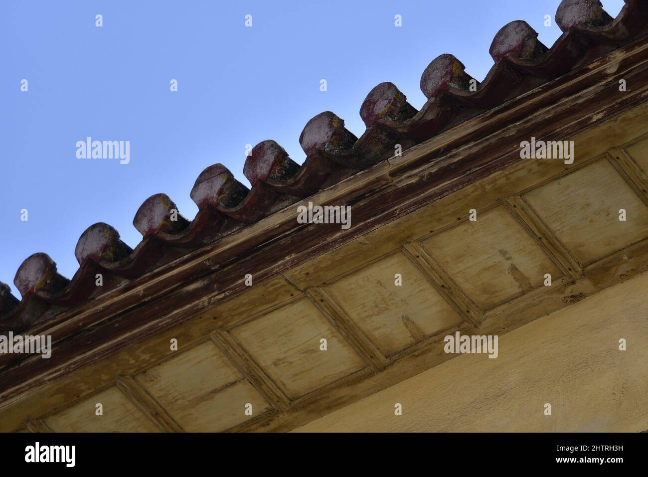 Old Neoclassical house rooftop with antique red clay antefix ...