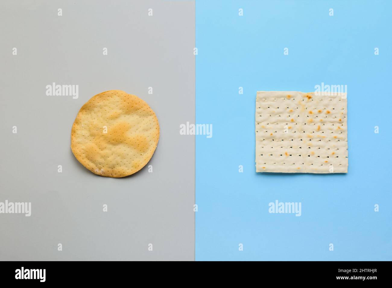 Different Jewish flatbread matza for Passover on color background Stock ...