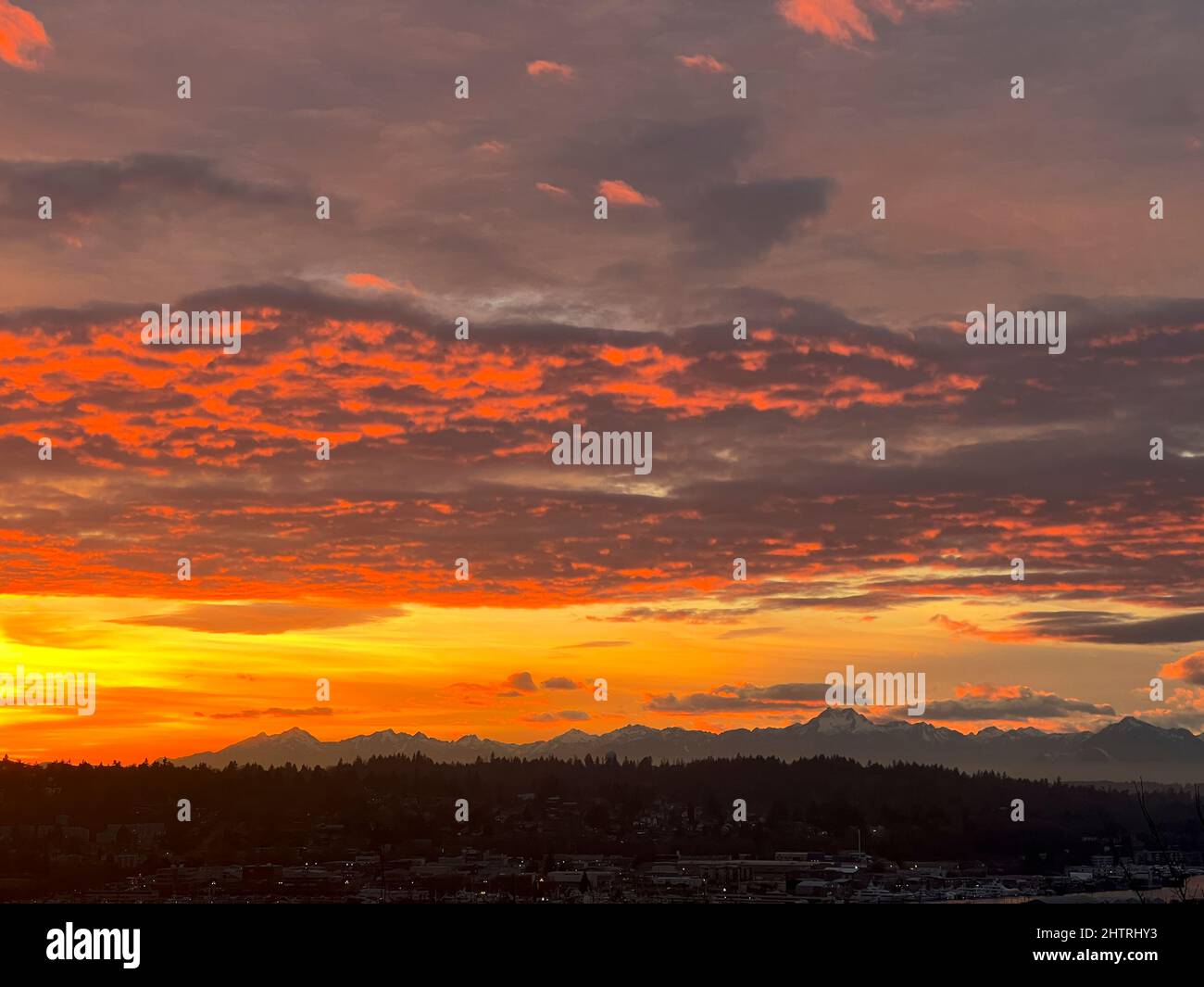 Colorful Sunset Over The Olympic Mountains From Seattle Stock Photo - Alamy