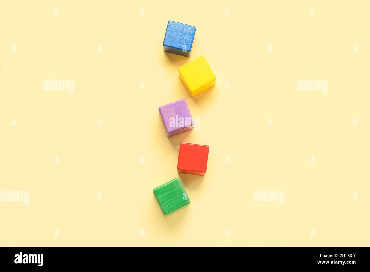 Colorful cubes on beige background. Concept of autistic disorder Stock ...