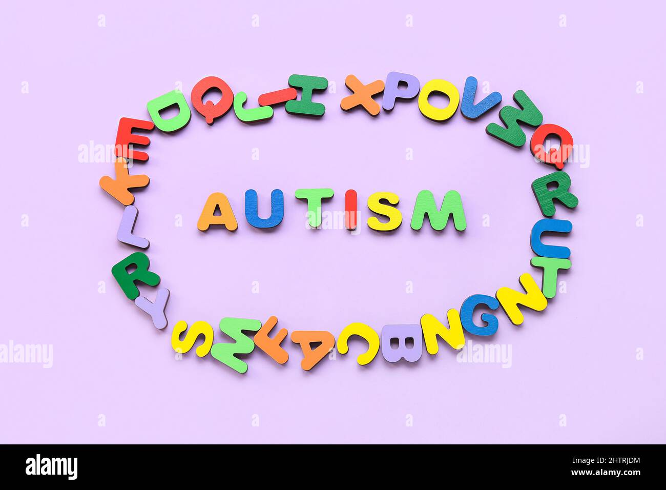 Word AUTISM with colorful letters on lilac background Stock Photo - Alamy