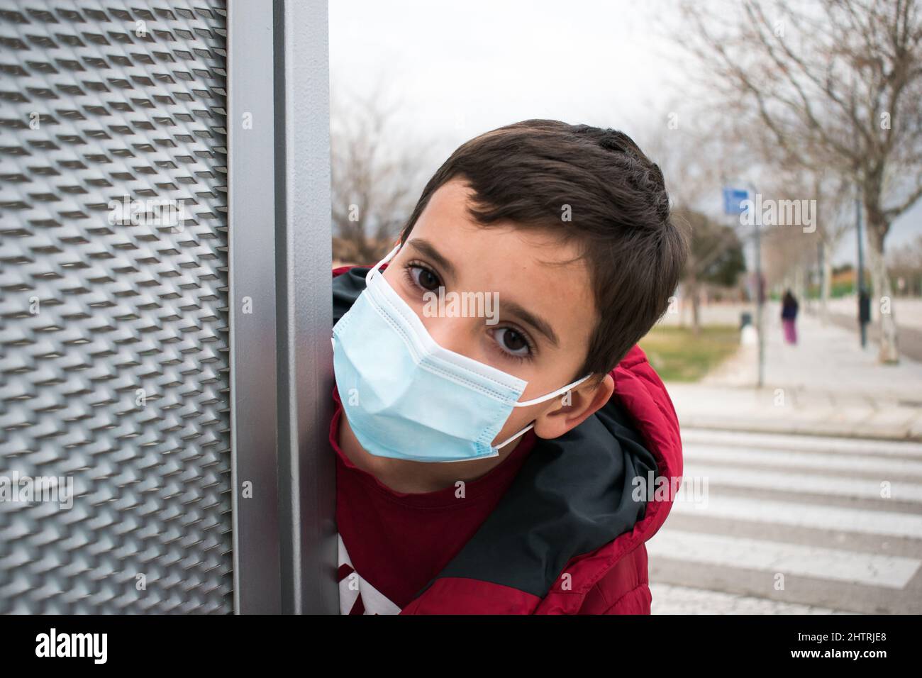 Child in pandemic childhood mask hi-res stock photography and images ...