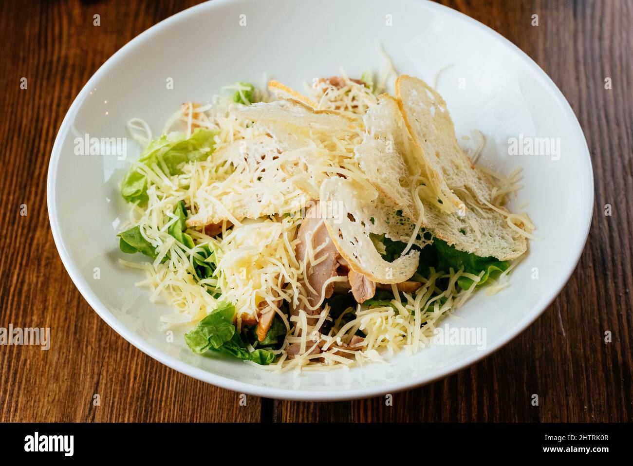 caesar salad with chicken . restaurant menu Stock Photo - Alamy