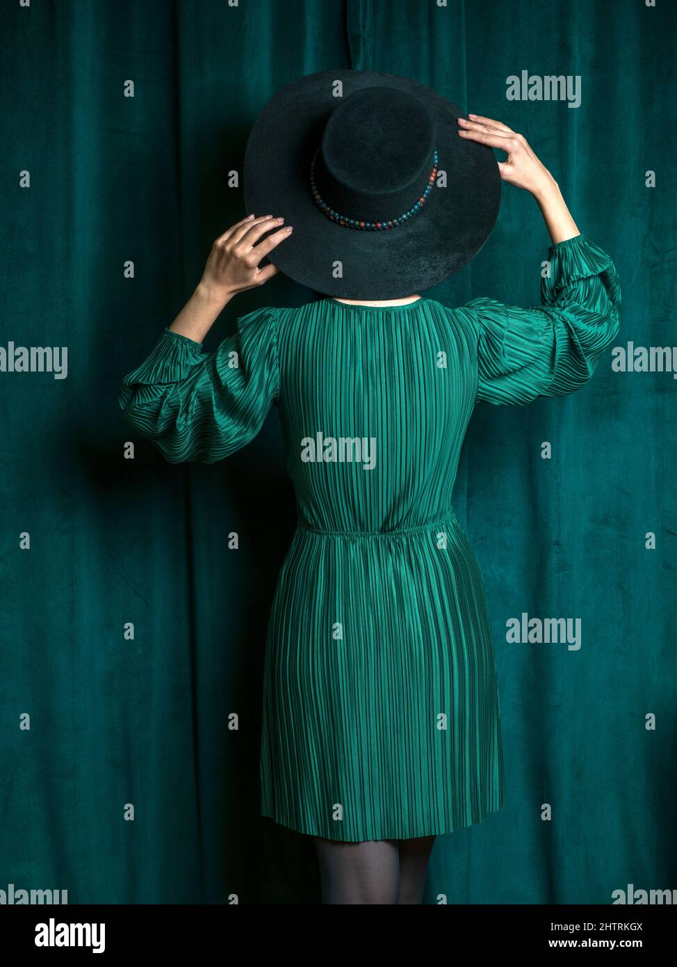 Woman in green dress hi-res stock photography and images - Alamy