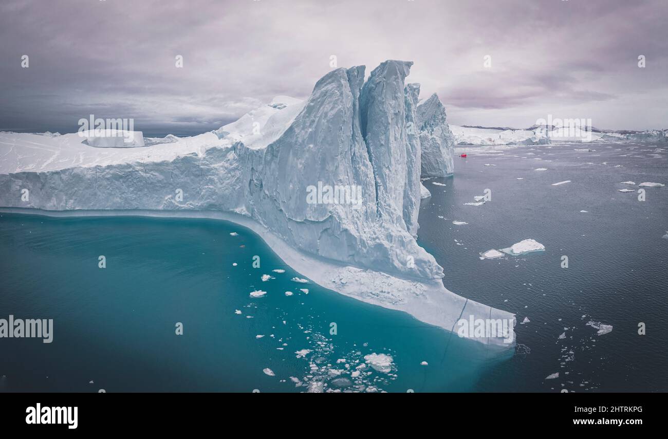 icebergs floating on the sea from aerial point o f view in panoramic ...