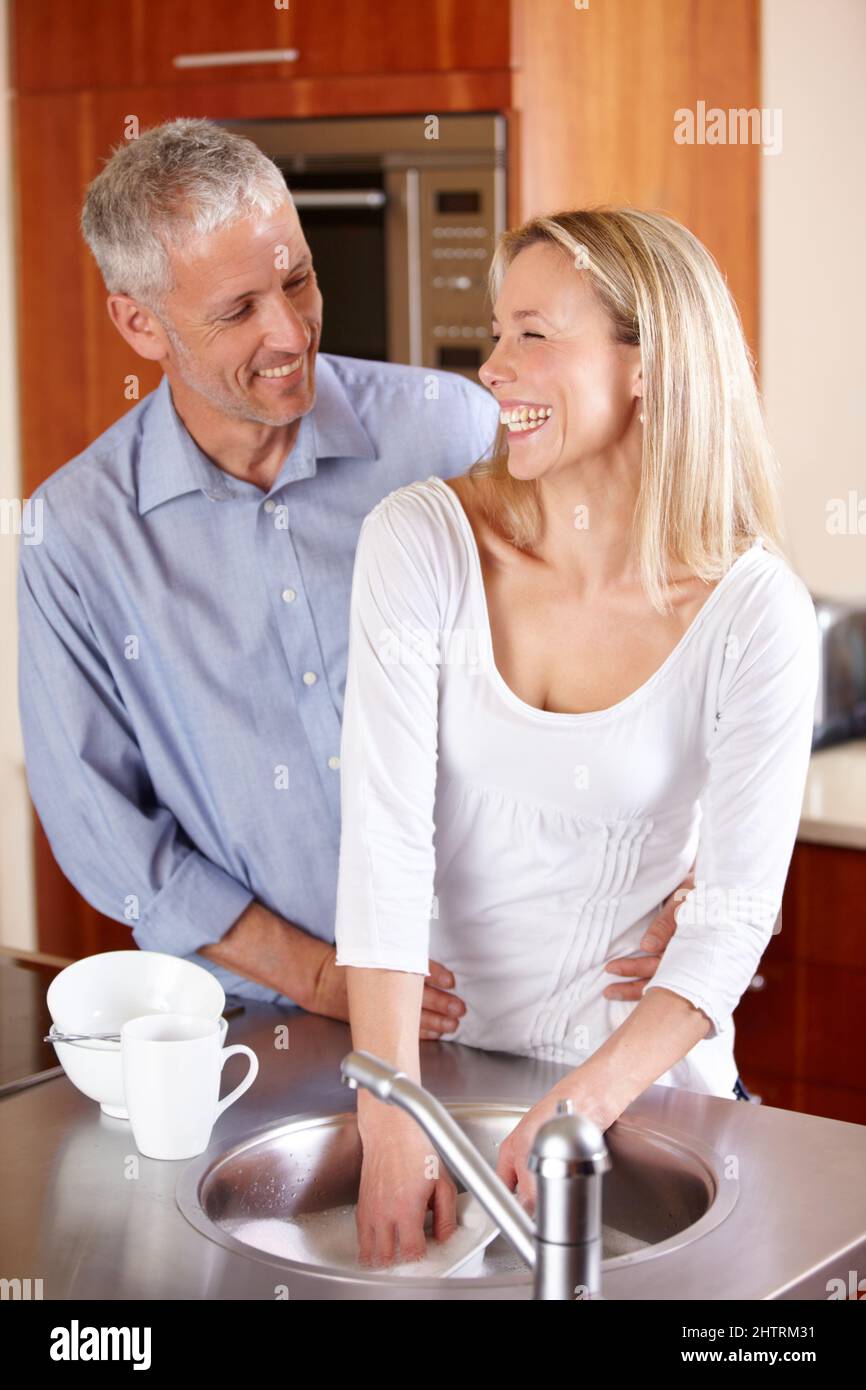 Honey, Im home. A husband surprising his wife with an affectionate ...