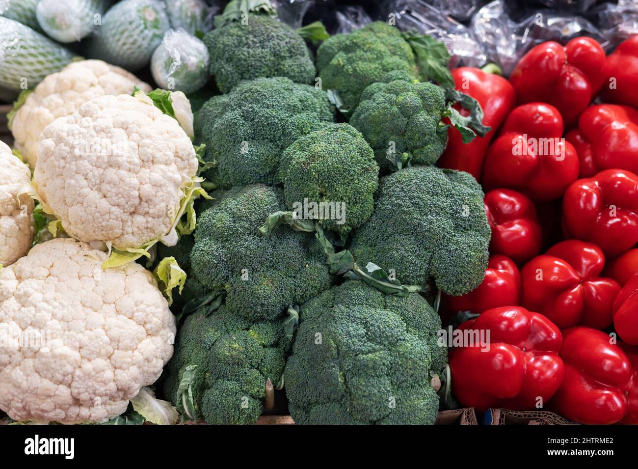 Vegetables at a market- Cauliflower, broccoli and red pepper as italian ...