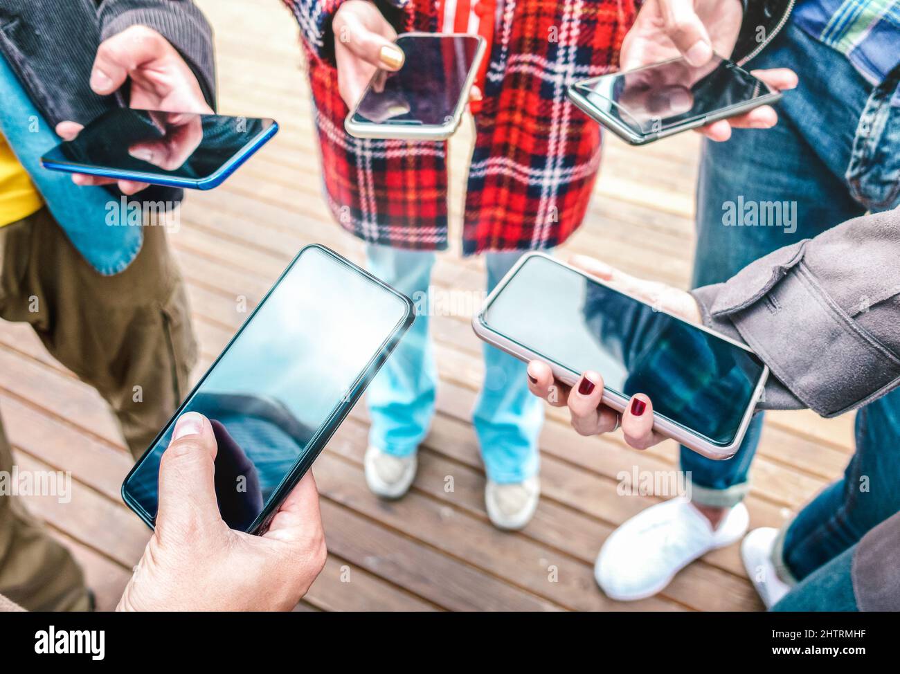 Close up of hands using mobile smart phones - People detail sharing ...