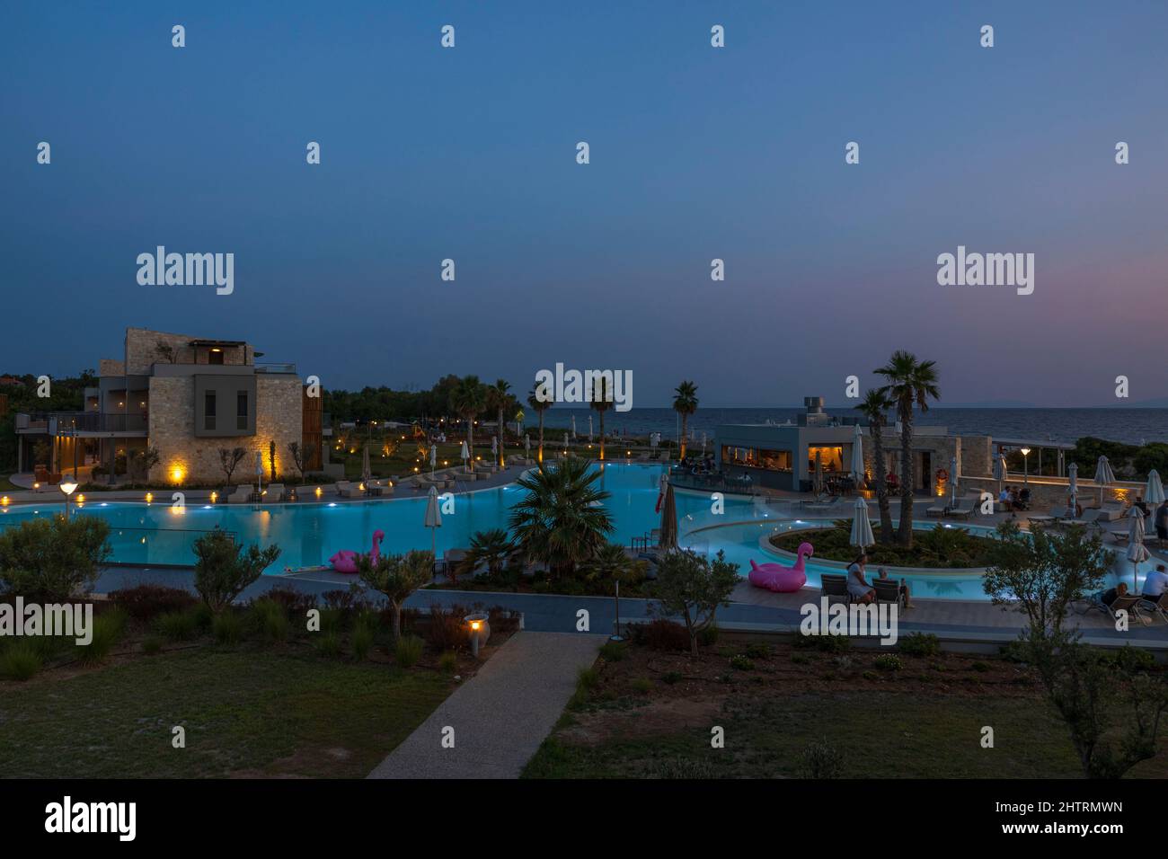 Beautiful night scenery overlooking hotel grounds. Lighting, trees ...