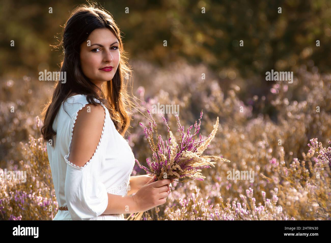 Pretty woman in long hi-res stock photography and images - Alamy