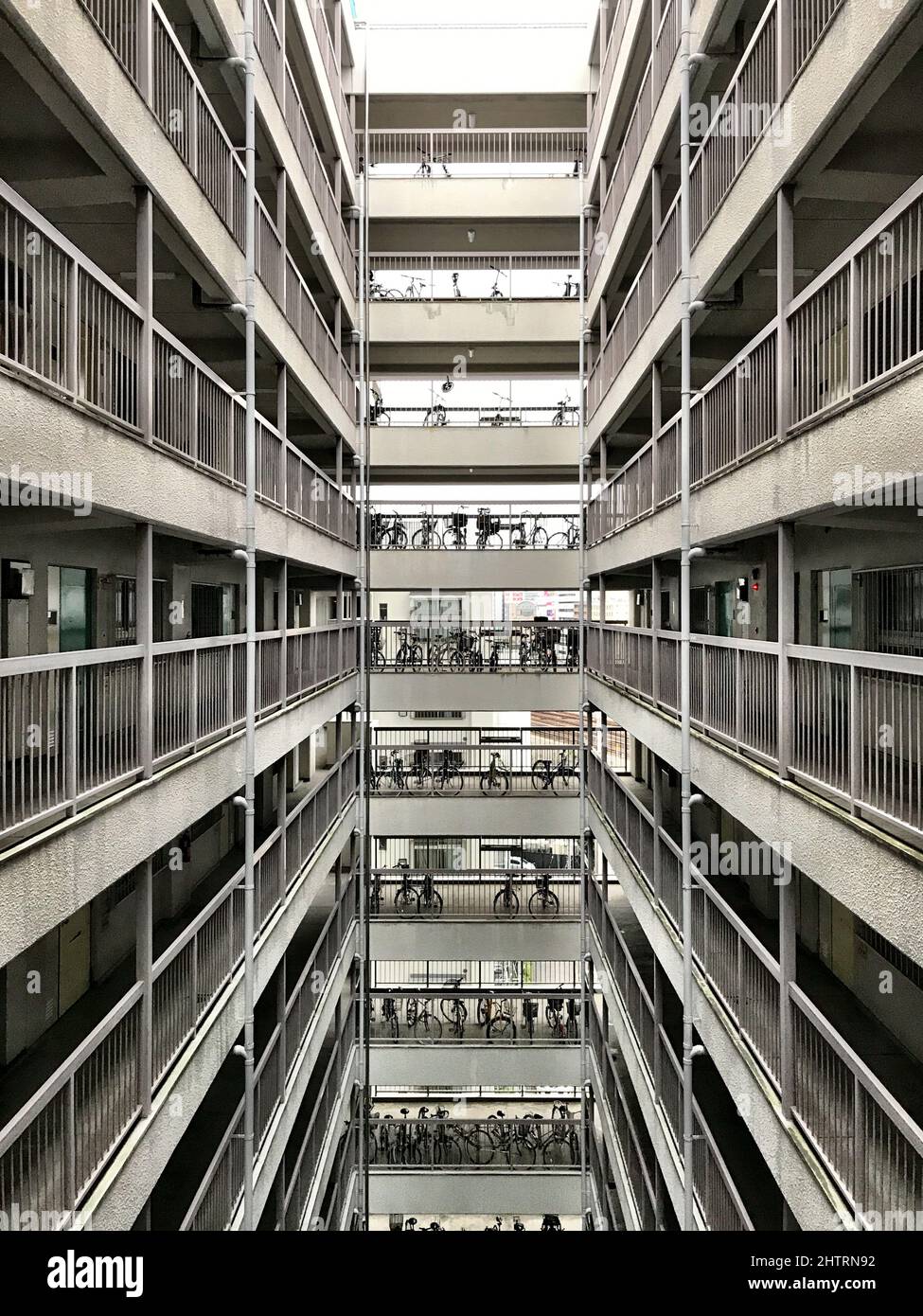Vertical shot of Corridor and stairwell of a multi-storey residential ...