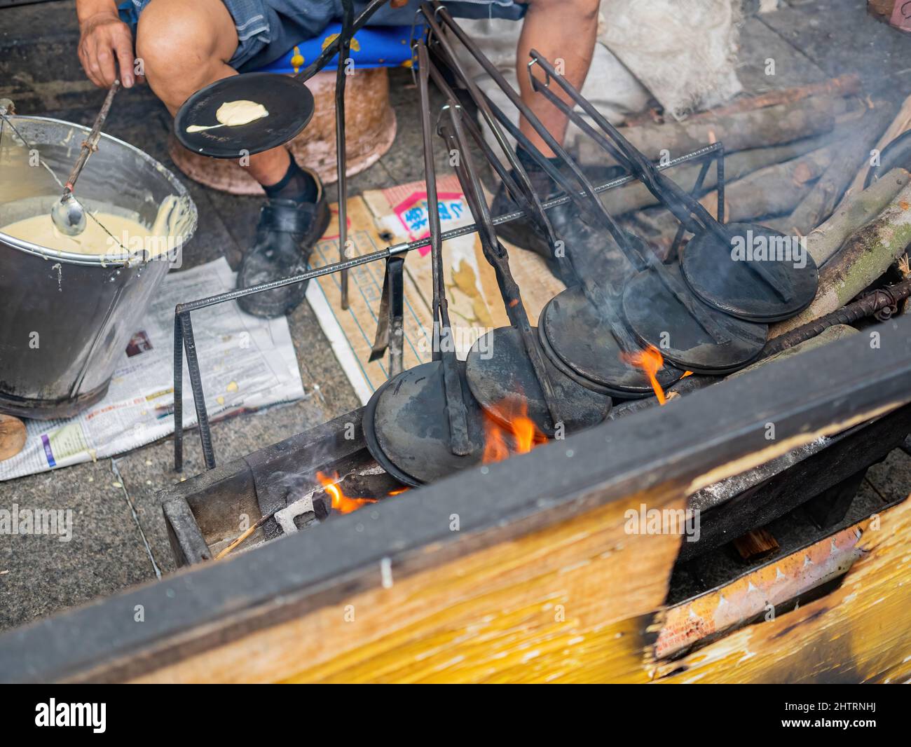 Close up shot of man grilling food at Kinmen, Taiwan Stock Photo - Alamy