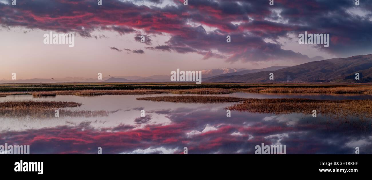 Landscape panoramic sunset scenery with clouds and reflections Stock ...