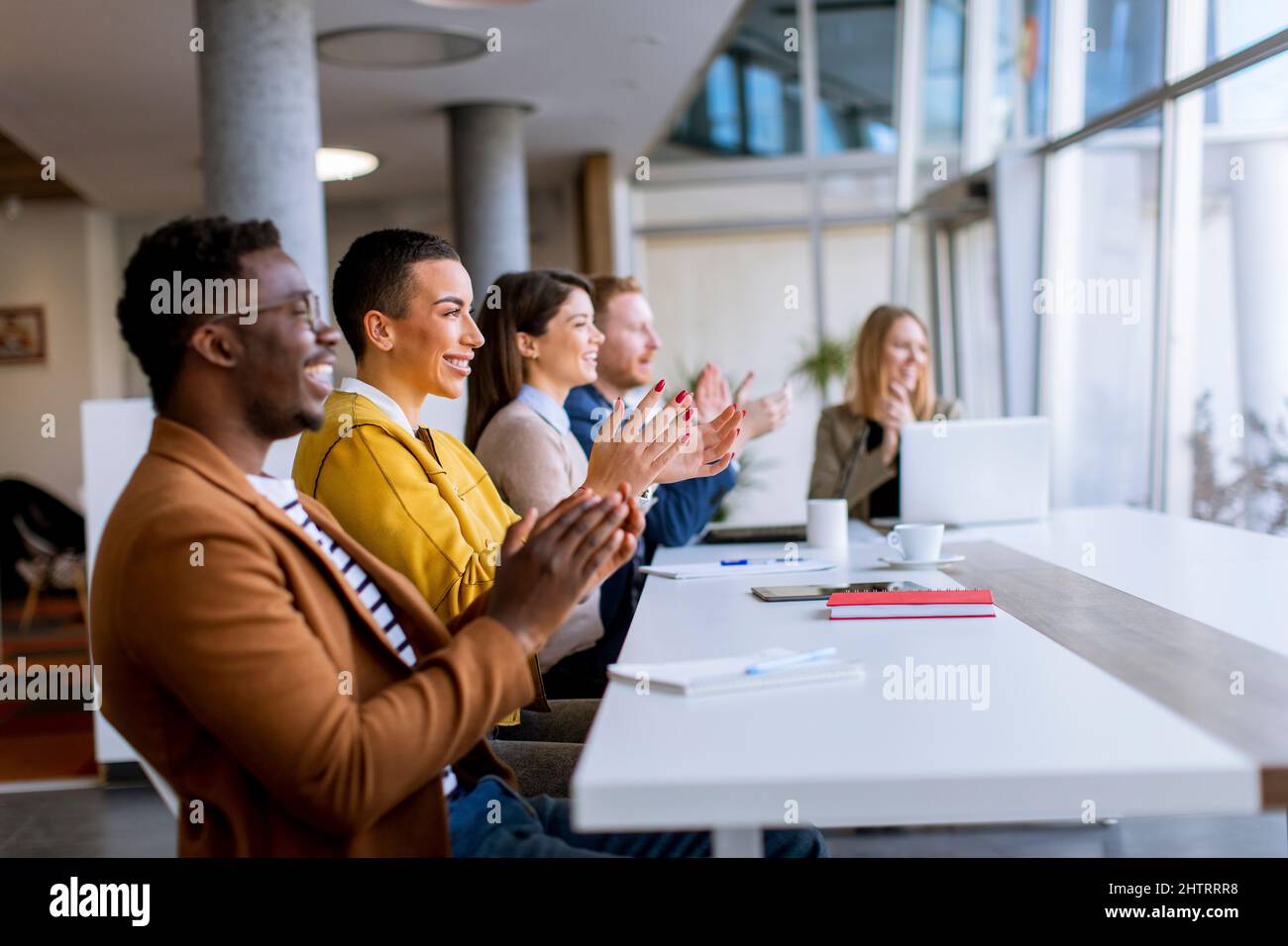 Group of young business people working together and preparing new ...