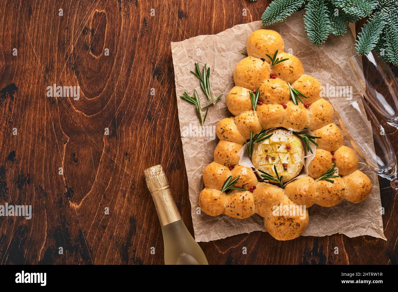 Bread buns Christmas tree with Roasted camembert cheese and rosemary on ...