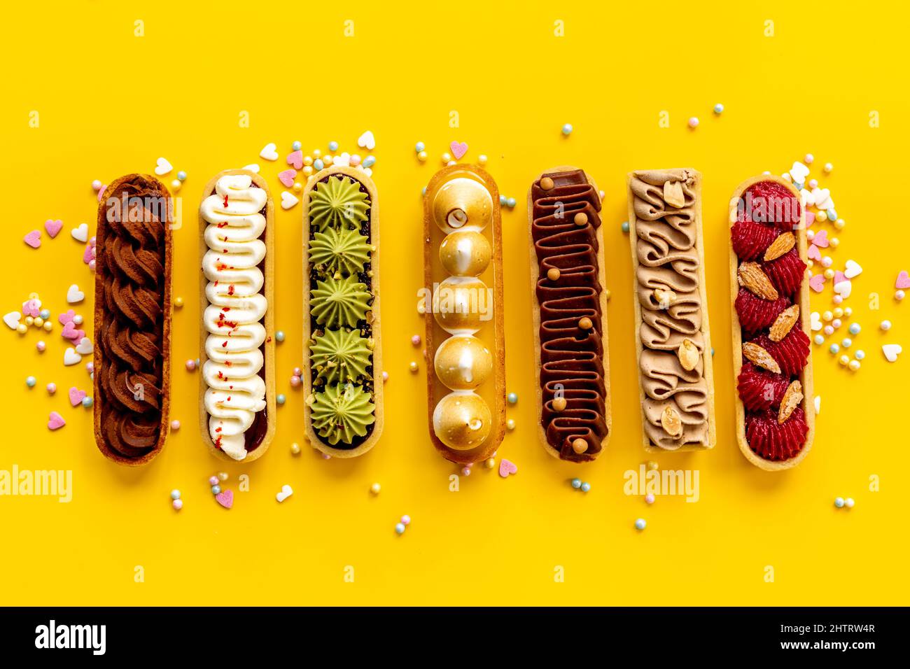 Delightful set of eclairs with pistachio raspberries and chocolate ...