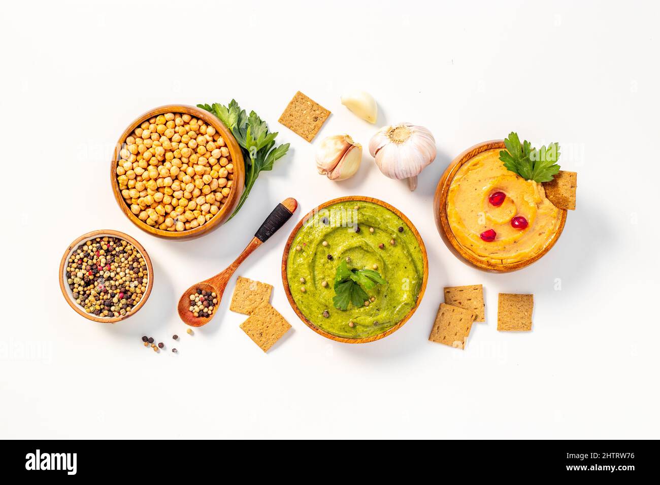 Hummus with snacks set - various types of hummus in bowls Stock Photo ...