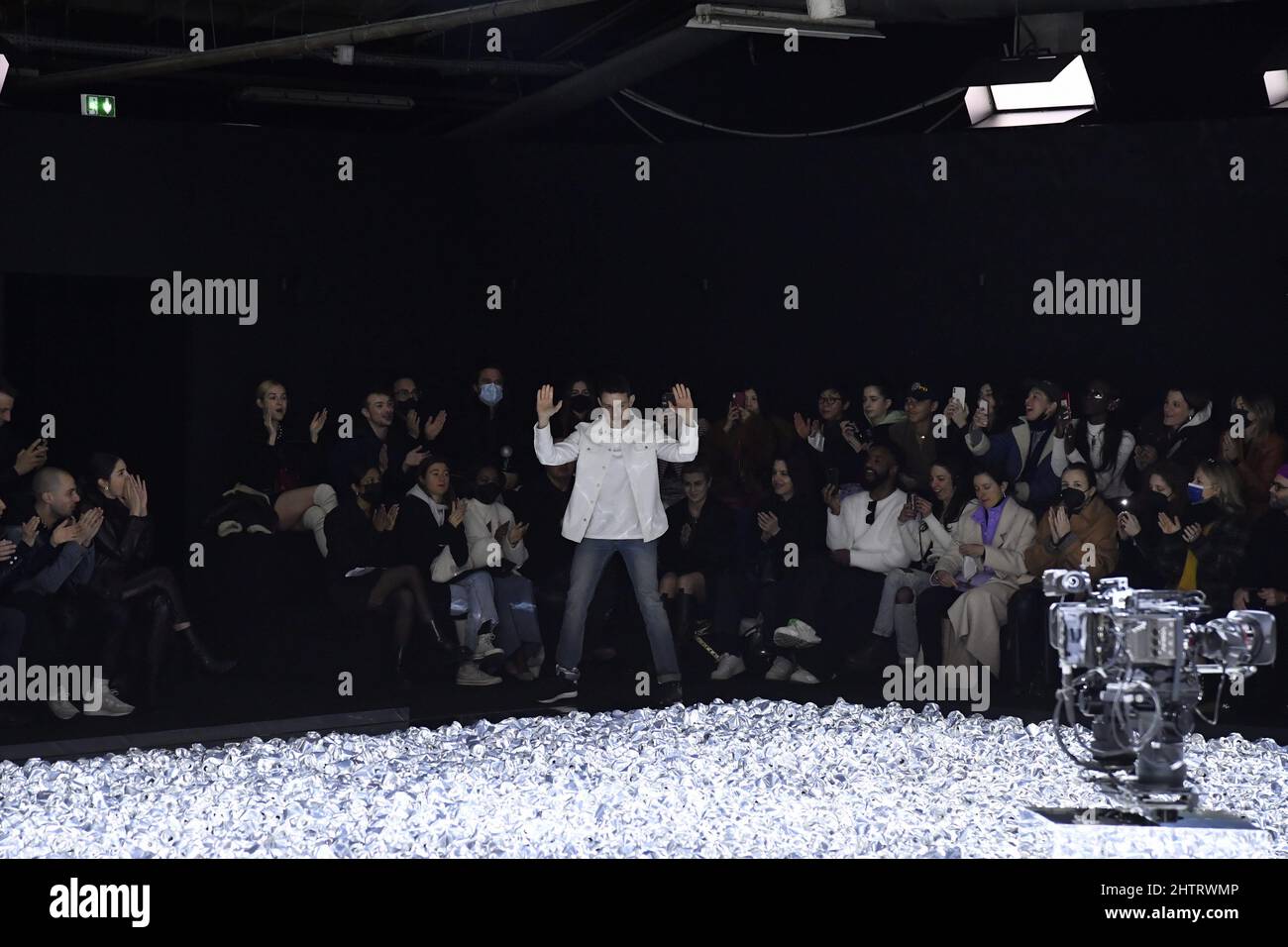 Designer Nicolas Di Felice walks on the runway at the Courreges fashion ...