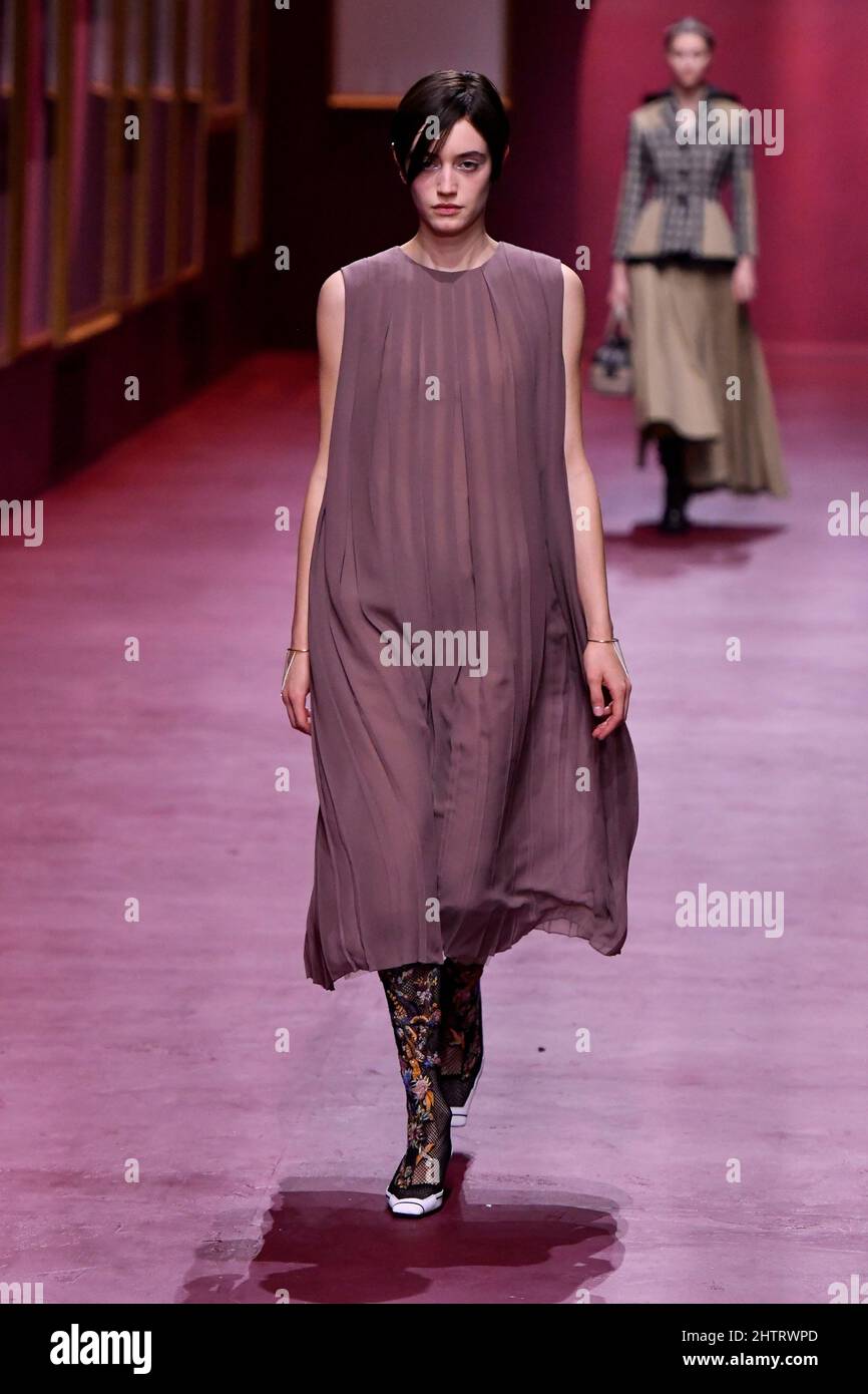 A model walks on the runway at the Dior fashion show during Fall/Winter 2022 Collections Fashion ...
