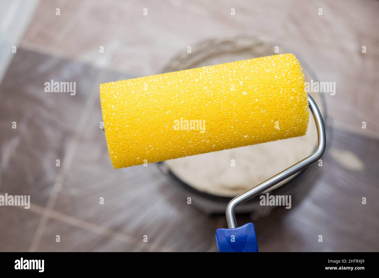 Roller Brush Painting, Worker painting on surface wall Painting ...