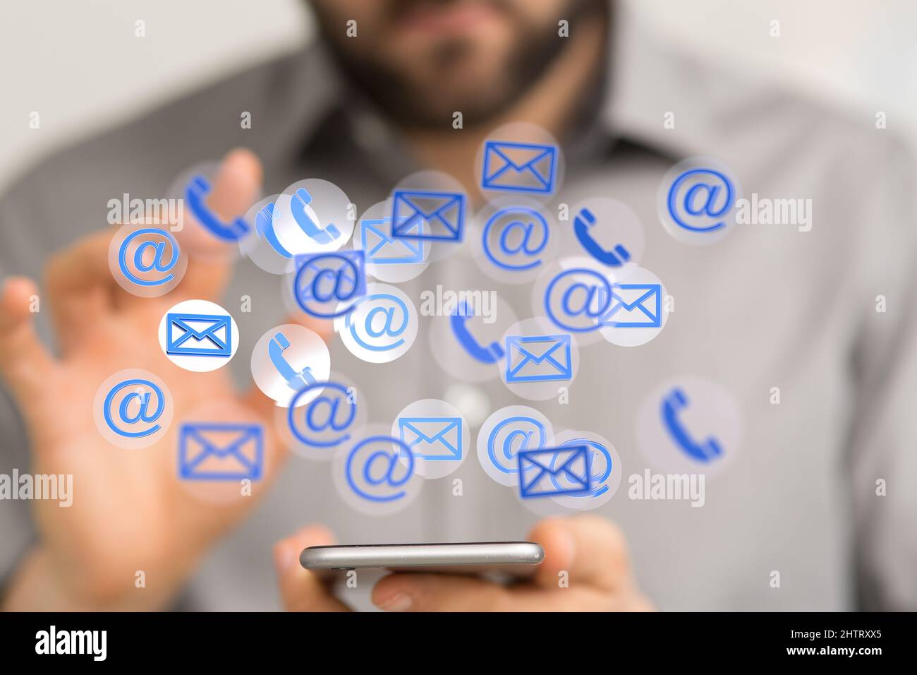 3d rendering of email, message and call symbols floating above a phone ...