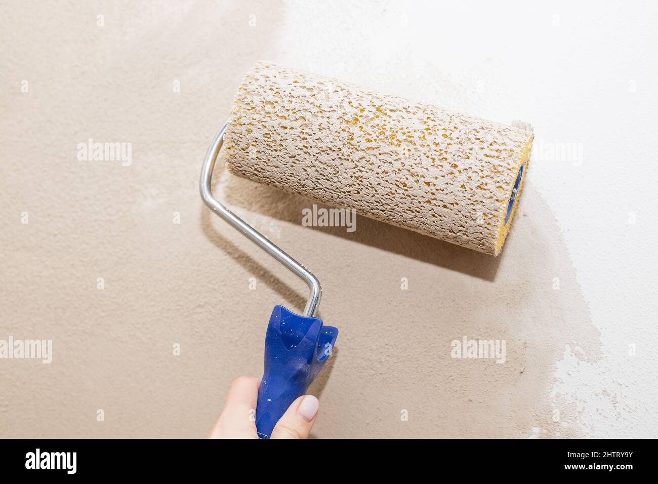 Roller Brush Painting, Worker painting on surface wall Painting ...