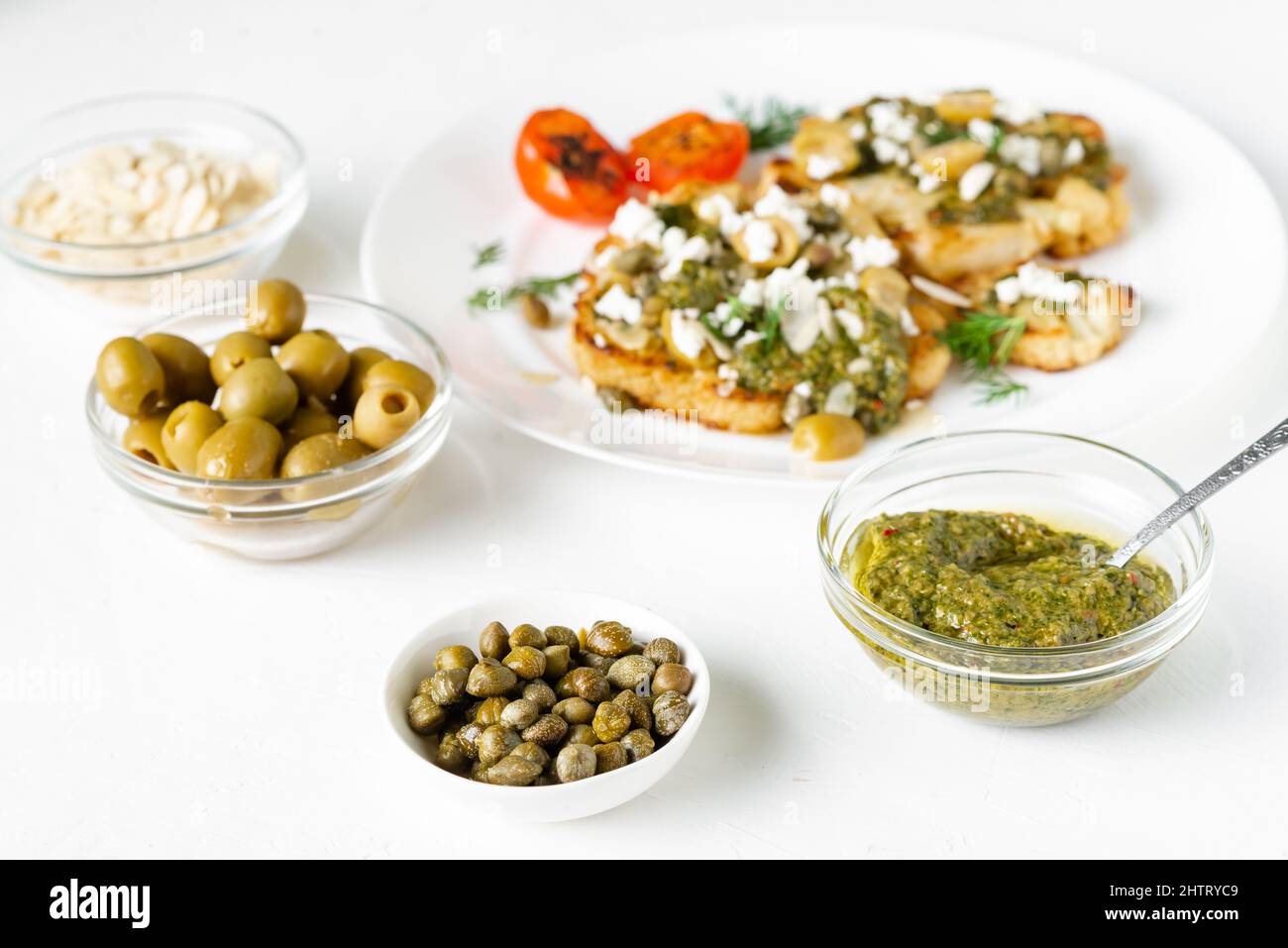 Capers. Vegetable food. Vegetarian food. White background Stock Photo ...