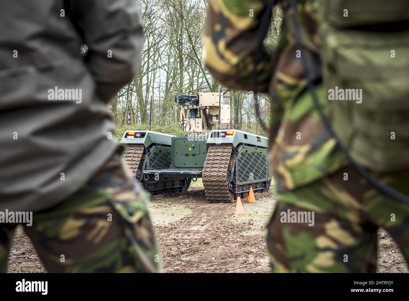 Army soldiers being trained to operate a Milrem Robotics THeMIs UGV ...