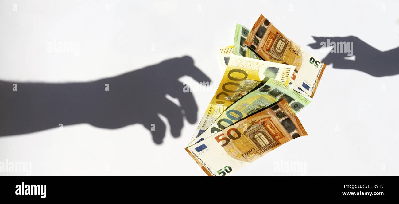 Euro banknotes isolated on white background, the corruption concept ...
