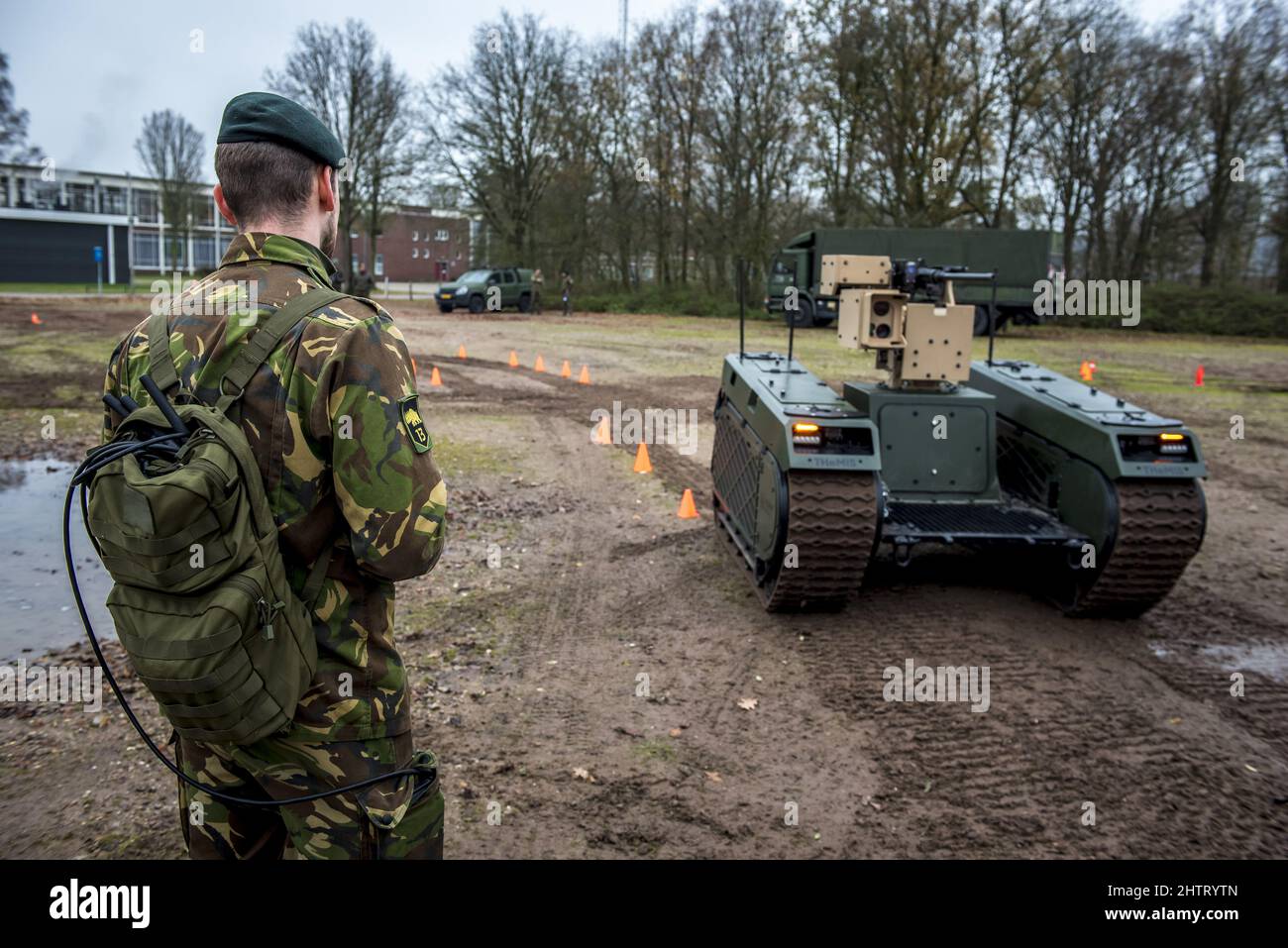 Army soldiers being trained to operate a Milrem Robotics THeMIs UGV ...