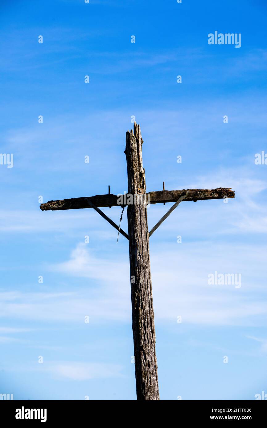 Vertical shot of an old electric pole shaped like a cross Stock Photo ...