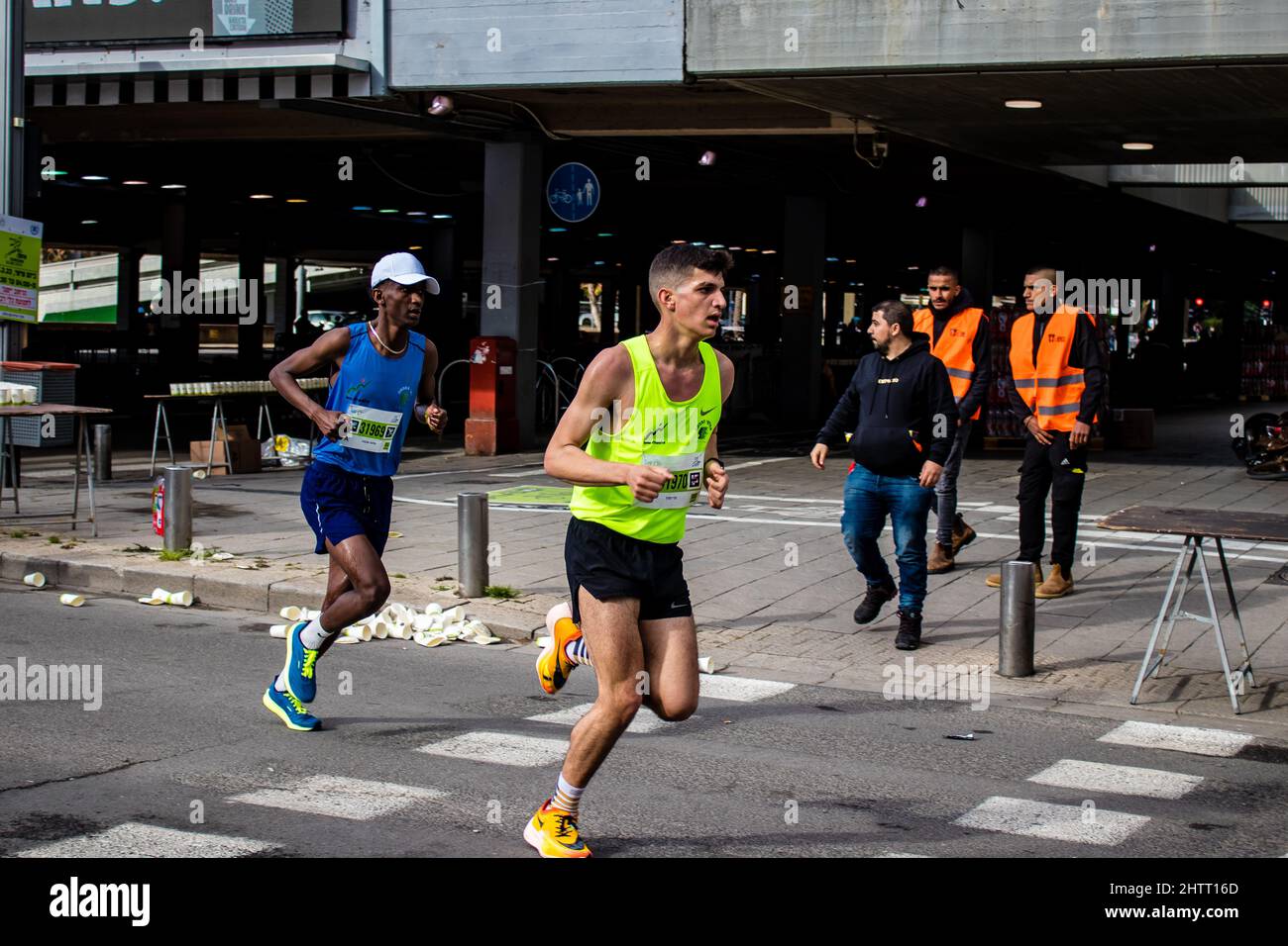 Tel Aviv, Israel - February 25, 2022 Runners in the street of Tel Aviv ...