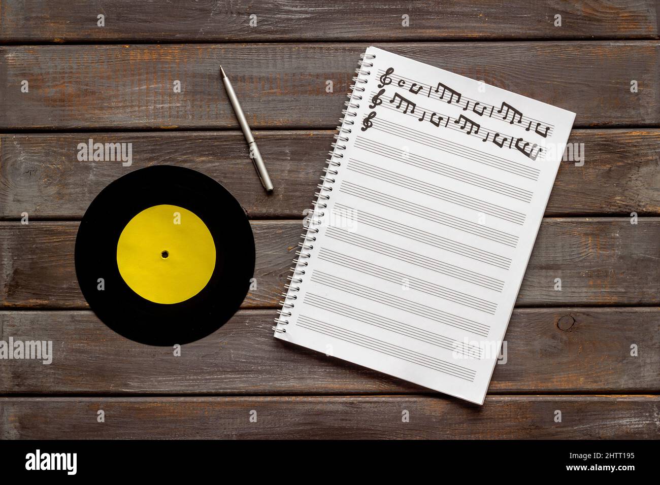 Sheets with music notes and vinyl record. Compose music concept Stock ...