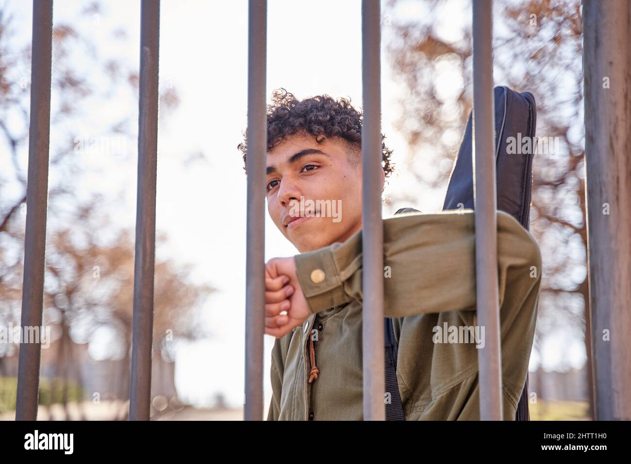 Man behind fence hi-res stock photography and images - Alamy