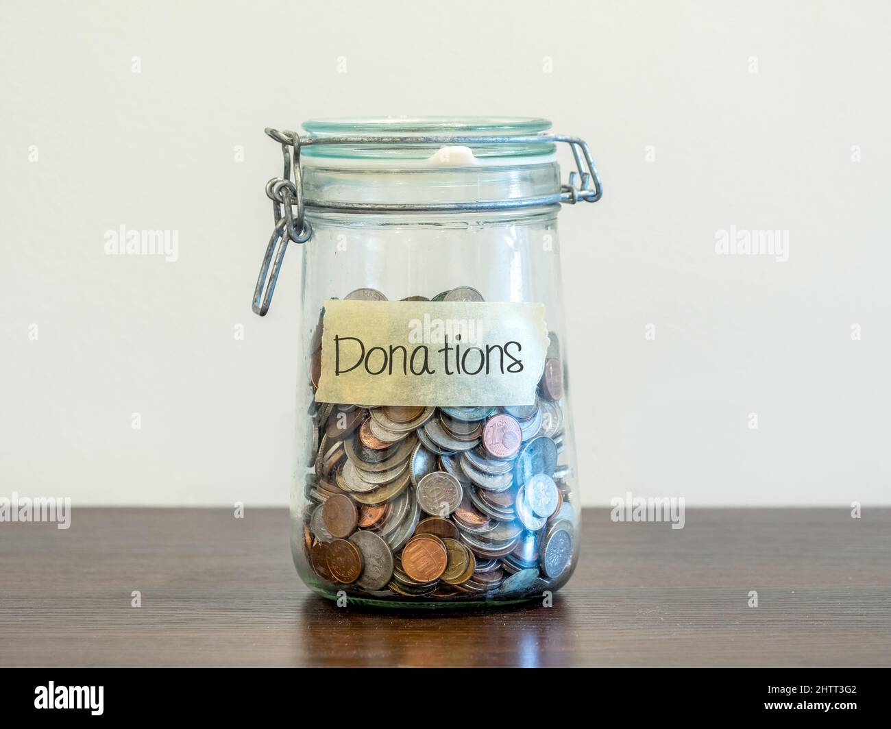 Donation jar hi-res stock photography and images - Alamy