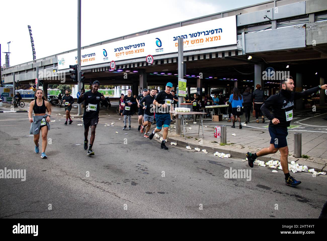 Tel Aviv, Israel - February 25, 2022 Runners in the street of Tel Aviv ...