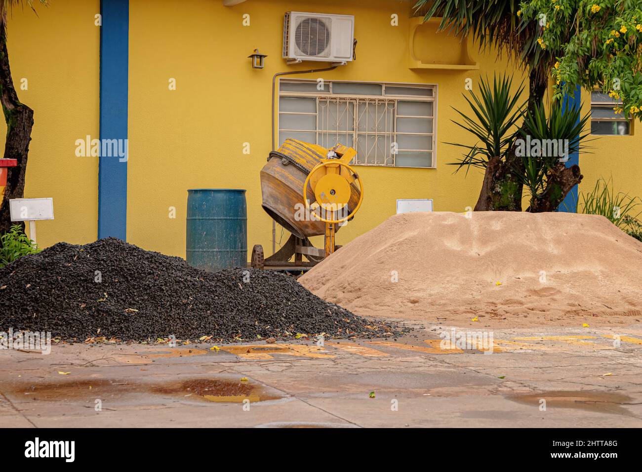 Yellow concrete mixer equipment for production of concrete under ...