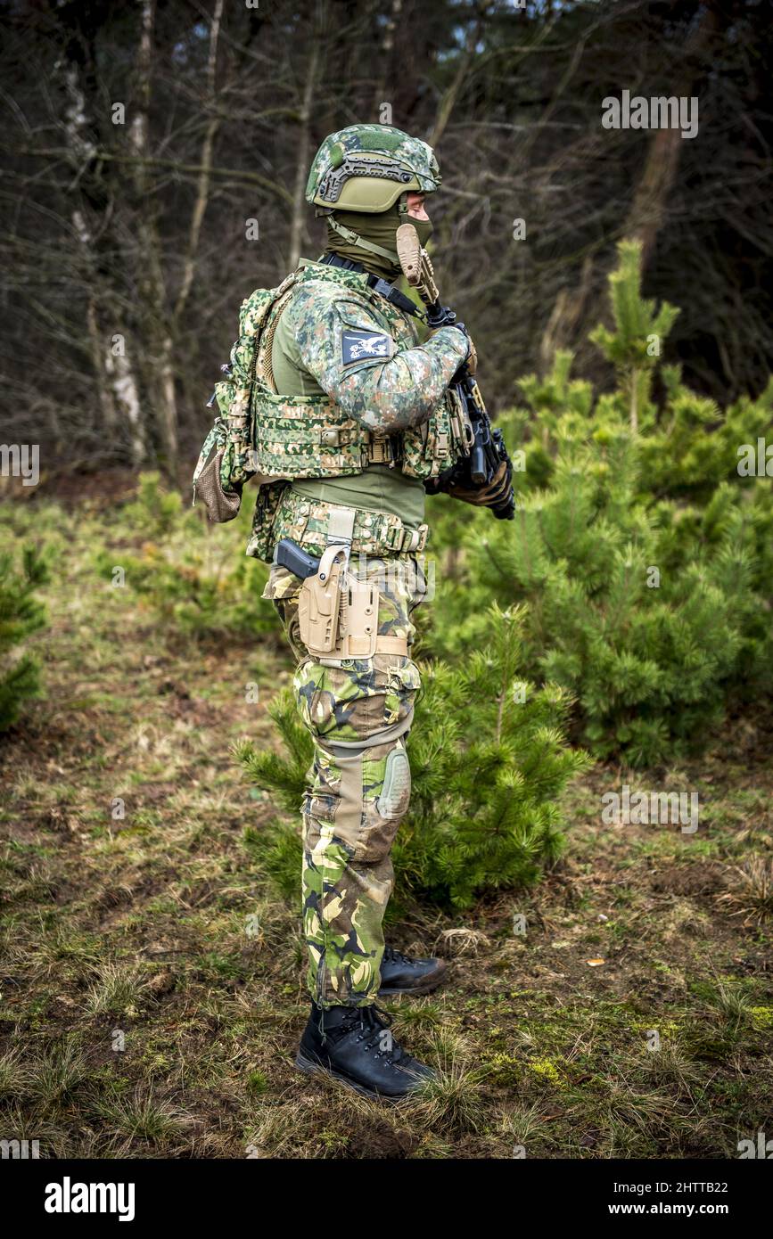 Vertical shot of a dutch soldier in a new uniform and personal ...
