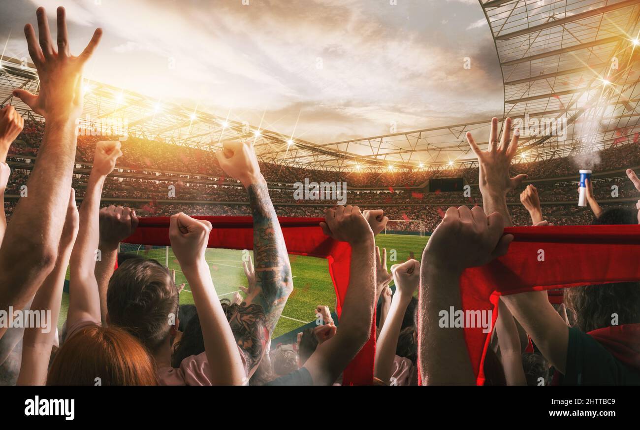 Football scene with cheering audience at the stadium Stock Photo - Alamy