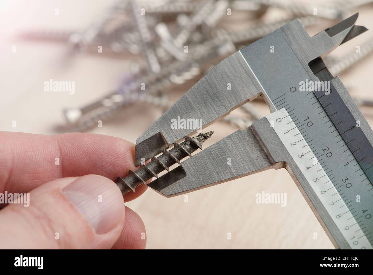 Measuring thickness hi-res stock photography and images - Alamy