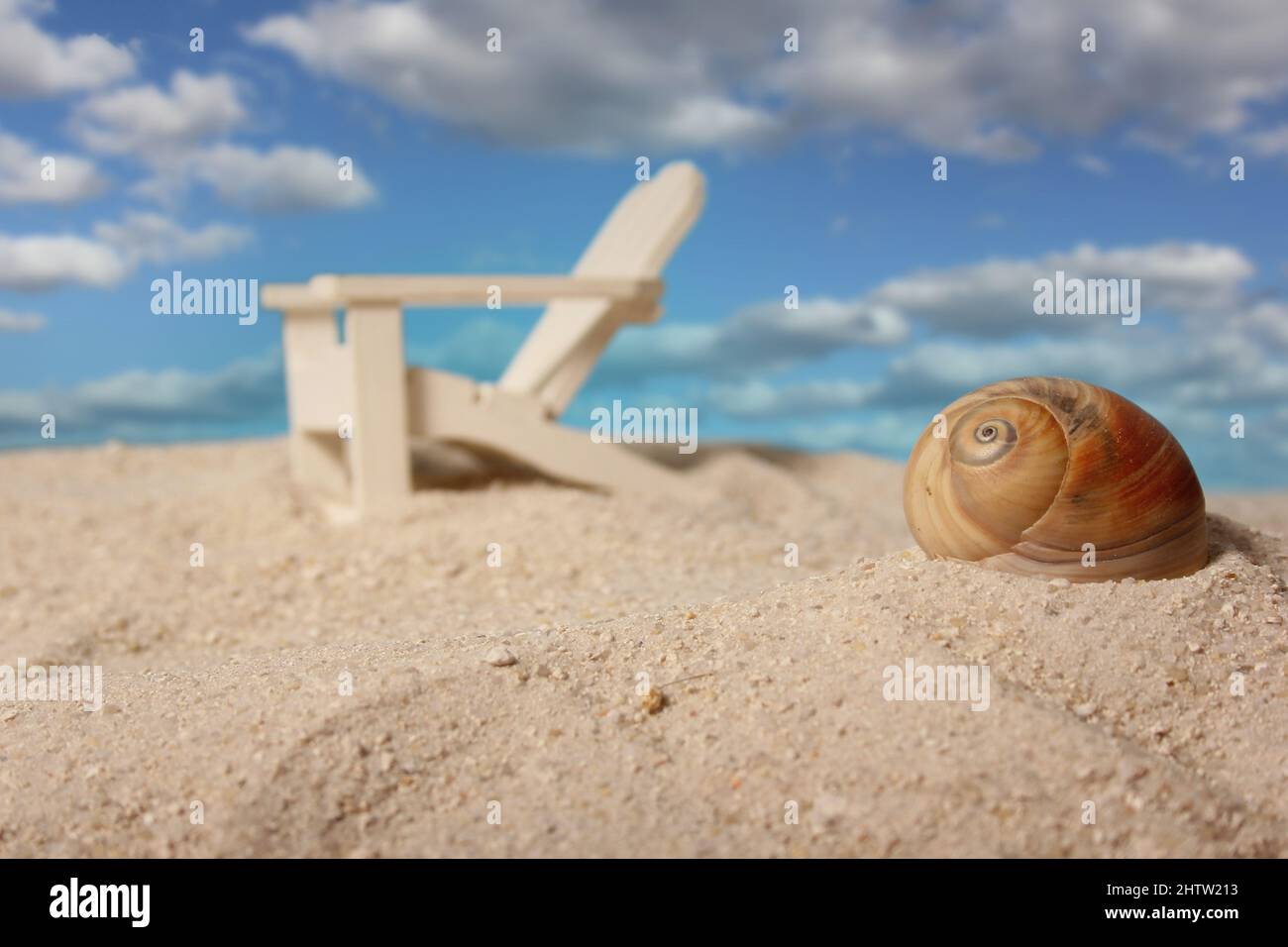 Sea Shell and Beach Chair on Sand, Shallow DOF, Focus on Shell Stock ...